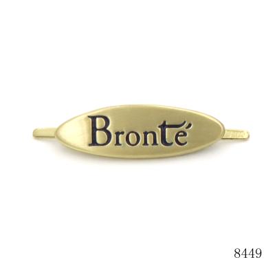 China Bag Parts Accessories Cap Hat Logo Label Engraving Gold Plated Metal Logo with Iron Prongs for sale
