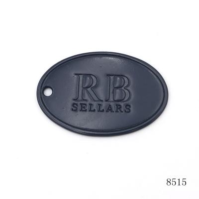 China Black Painting Oval Alloy Tag Custom Metal Engraved Logo Tag for Bags or Clothing for sale