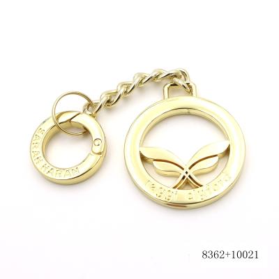 China Fashion Design Metal Key Chain Tag Charm Luxury Hollow Metal Logo Label Customized Bag Charm for sale