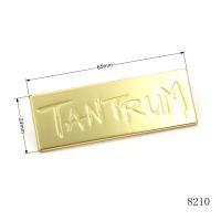 China Custom Gold Metal Logo Plate 65x24mm Engraved Brand Name Plate for Handbags for sale