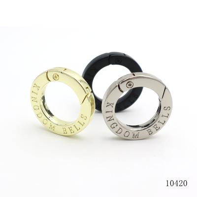 China Custom Spring Ring Buckle Zinc Alloy Metal Open O Ring, OEM ODM Embossed Logo Spring O‑Ring, Custom Engraved Metal Snap Ring for Handbag Hardware Accessories for sale