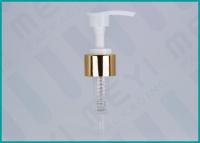 China 24/410 Screw Lock Lotion Pump Dispenser With Shiny Gold Aluminum Collar for sale