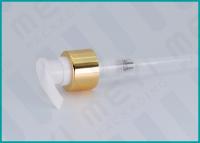 China 24/410 Screw Lock Lotion Pump Dispenser With Shiny Gold Aluminum Collar for sale