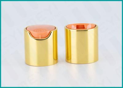 China 24/410 Shiny Gold Disc Top Cap / Bottle Caps And Closures With Orange Actuator for sale