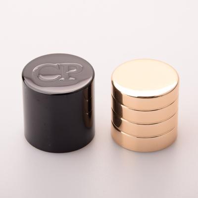 China Customized Perfume Bottle Caps in Gold/Silver for sale