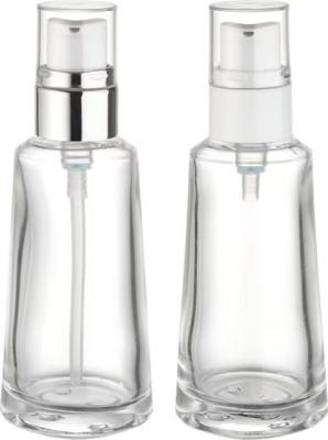 China Round Glass Cosmetic Pump Bottle For Facial Treatments And Serums for sale