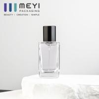 China 30ml Square Clear Glass Perfume Bottle with Black Cap and Pump Sprayer for sale