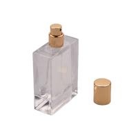 China 50ml Rectangular Glass Perfume Bottle with Magnetic Gold Cap for sale