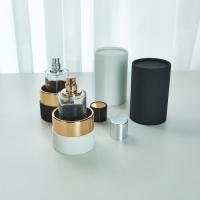 China 50ml Round Luxury Glass Perfume Bottle with Magnetic Cap and Black Soft-touching Paper Tube Box for sale