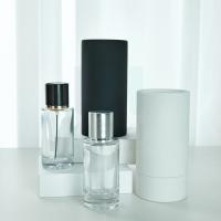 China 50ml Round Luxury Glass Perfume Bottle with Magnetic Cap and Black Soft-touching Paper Tube Box for sale