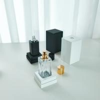 China 50ml Black Glass Perfume Bottle with Magnetic Cap and Black Tube Box for Premium Perfume Packaging for sale