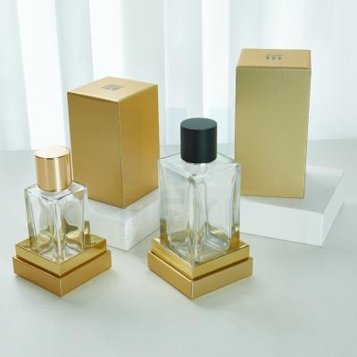 China 50ml Black Glass Perfume Bottle with Magnetic Cap and Black Tube Box for Premium Perfume Packaging for sale