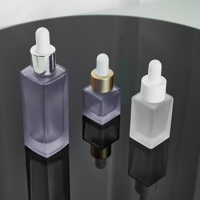 China Screen Printing Flat Shoulder Cosmetic Glass Oil Dropper Bottle Including Glass Dropper Perfect for Essential Oils Skincare Serums and Cosmetic for sale