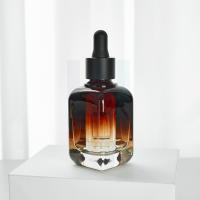 China Screw Cap Glass Dropper Bottles Round Design Featuring Screen Printing Hot Stamping and Labeling for Liquid Product Containers for sale