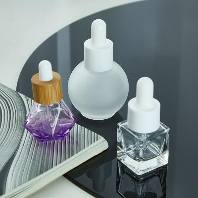 China SGS Certified Round Glass Liquid Containers Manufactured to Meet Strict Standards for Liquid Storage and Transportation for sale