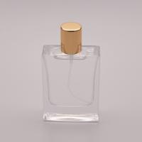 China 50ml Flat Glass Perfume Bottle With Small Gold Cap for sale