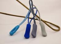 China Custom TPU Plastic Zipper Puller with 2.0-2.5mm String and 15kg Tensile Strength for Bags and Clothing for sale