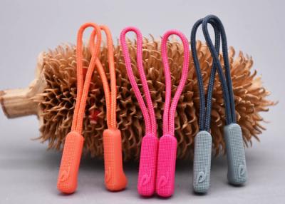 China 3D Embossed Plastic Zipper Puller with 2.0-2.5mm Polyester String for Garments and Bags for sale