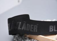 China Garment Custom Logo Polyester Webbing Straps Embossed 35mm Black for sale