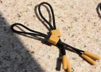 China Custom 3D Logo Plastic Zip Puller for Garments - 2.0-2.5mm String with 15kg Tensile Strength for sale
