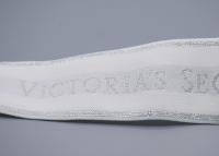 China Custom 35mm White Jacquard Elastic Tape with Shiny Silver Logo for Garments for sale