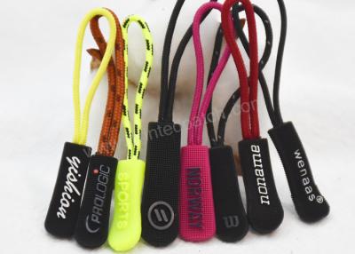 China Custom PVC TPU Silicone Zipper Puller 56mm x 8mm with 3D Raised Logo for Garment & Bag Industry for sale
