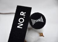 China 0.5mm Degradable White TPU Logo Patches with 20mm Black Velcro for Sportswear and Clothing for sale