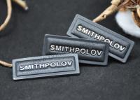 China 0.5mm PU Leather Logo Patches - Custom Silver Metallic Brand Labels with 3D Effect | 100pcs MOQ for sale