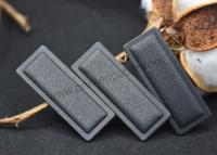 China 0.5mm PU Leather Logo Patches - Custom Silver Metallic Brand Labels with 3D Effect | 100pcs MOQ for sale