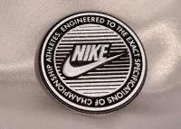 China Embossed Round Nik Logo TPU 3M Reflective Labels 300psi for Sweatpants for sale