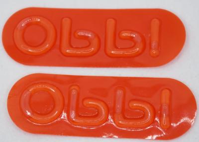 China Custom Injection Molding TPU Cuff Tabs with 3D Logo Patches - 500pcs MOQ, 10-12 Day Mold Making for sale