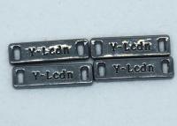 China Custom Metal Zipper Puller with 3D Debossed Logo - OEKO-TEX Certified for Luggage & Handbags - 500pcs MOQ for sale