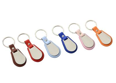 China Debossed Logo PU Leather Keychain Keyring Edge Coating Metal Key Holder for sale