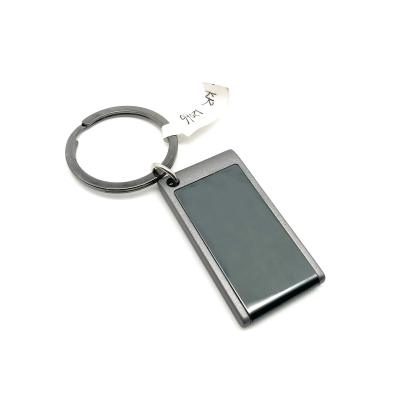 China Metal Keychain Holder Iron Keychain Container with Black Gun for sale