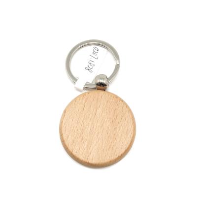China Custom Engraved Wooden Keychain Durability Decorative Key Ring With Personalized Design for sale