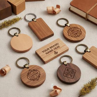 China Varies Depending On Customization Engraved Wooden Keychain Made From Natural Wood Tones Perfect For Corporate Gifts Purposes And Custom Branding for sale