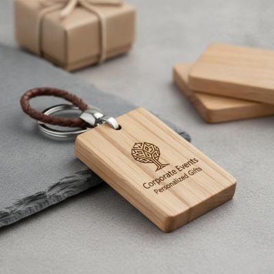 China Engraving Wooden Keychain Engraving Featuring Natural Wood Tones Souvenir Perfect For Corporate Events Personalized Gifts for sale