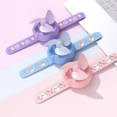 China ETEK Watch-style mini fan with 300mAh battery, 3 colors (Purple/Pink/Blue), includes charging cable + manual. for sale