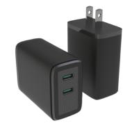 China Dual USB-C GaN Charger With 65W Max Output PD Multi-protocol 110-240V Global Voltage Black / White for sale