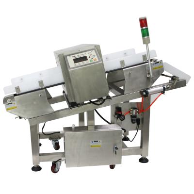 China Detector de metales español , detector de metales inclinado para conectar 2 líneas de producción for sale