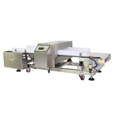 China Frozen Food 304 Stainless Belt Conveyor Metal Detectors With Push Rod Ejector for sale