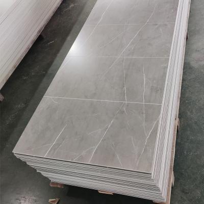 China Waterproof 4mm 5mm PVC Plastic Stone Marble SPC Wall Panel Tiles for Hotel Interior for sale