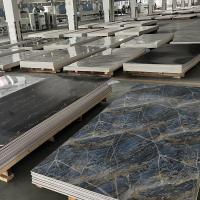 China Modern Style Grey Tile Effect Bathroom PVC Wall Panels for Interior Wet Wall Cladding for sale
