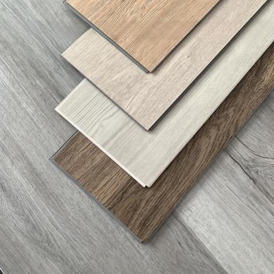 China Unilin Click System Modem PVC Tiles Floor Wood Vinyl Flooring SPC Interlocking Plank for sale