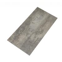 China 2023 Rigid Core SPC Flooring with Unilin Locking Click System in Simple Color Grey for sale