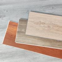 China Wear Resistant 4mm Luxury SPC Core Plastic Tile for Waterproof PVC Vinyl Wood Flooring for sale