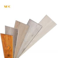 China Luxury SPC Hybrid Vinyl Wood Grain Flooring Plank with 0.5mm Wear Layer and UV Coating for sale