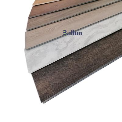 China Thickness 2mm-6.5mm Unilin Click System Durable Waterproof Vinyl SPC Gloss Flooring for sale