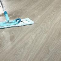 China 4mm SPC Anti Slip Rigid Vinyl Plastic Flooring With Cilck Wood Texture for Bathrooms for sale