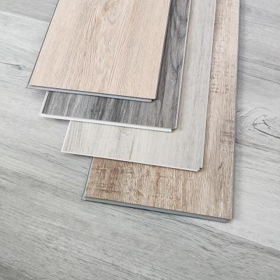 China Indoor Spaces Unbelievable Waterproof SPC Vinyl Flooring 4mm Tile with IXPE Padding for sale
